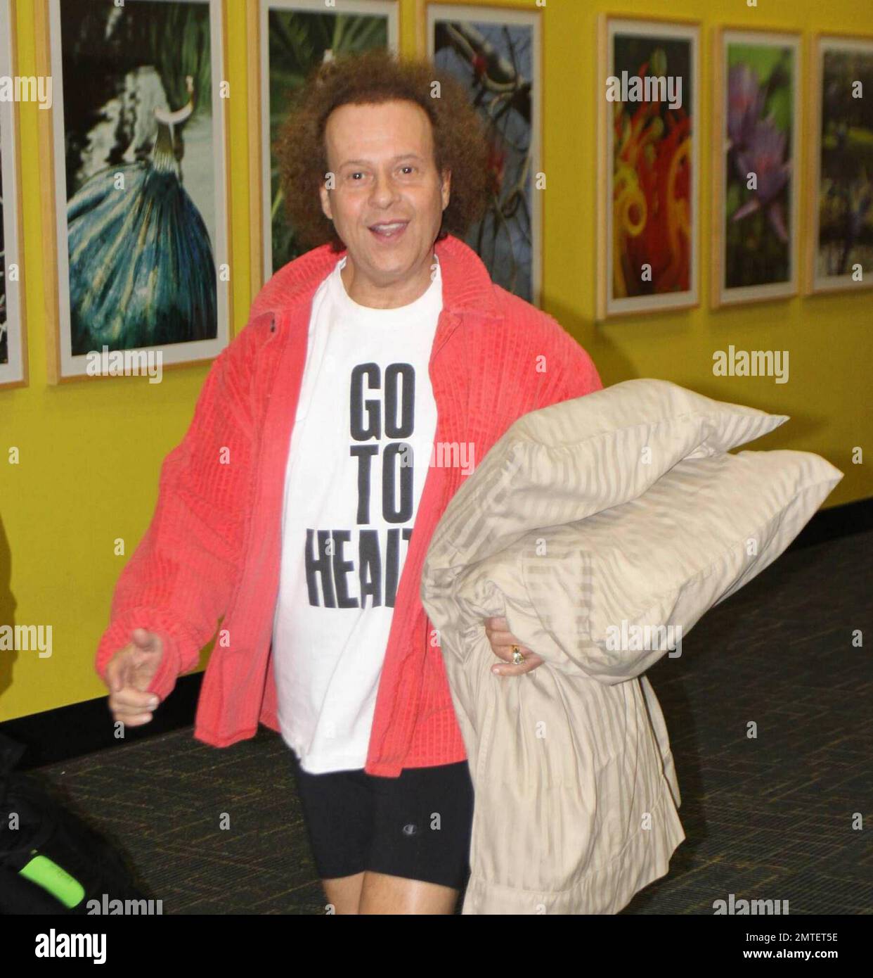 Exclusive!! Fitness guru Richard Simmons poses for photos with a friend ...