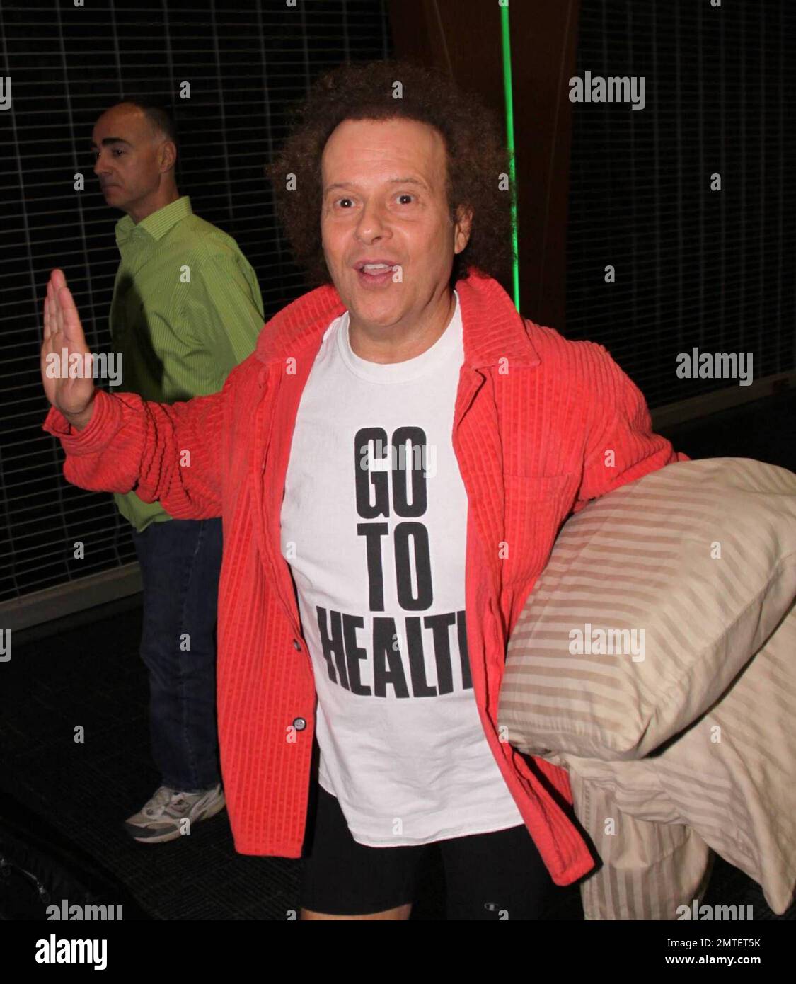 Exclusive!! Fitness guru Richard Simmons poses for photos with a friend ...