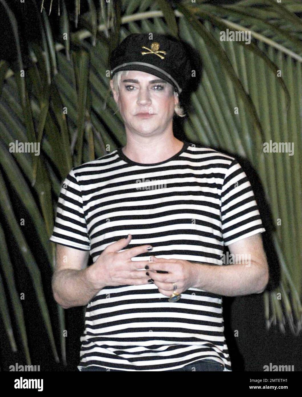 Richie Rich wears retro roller skates at the launch of his new fashion ...