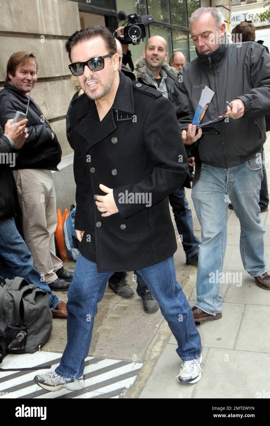 Comedian Ricky Gervais looks slim and trim as he arrives at BBC Radio 2 ...