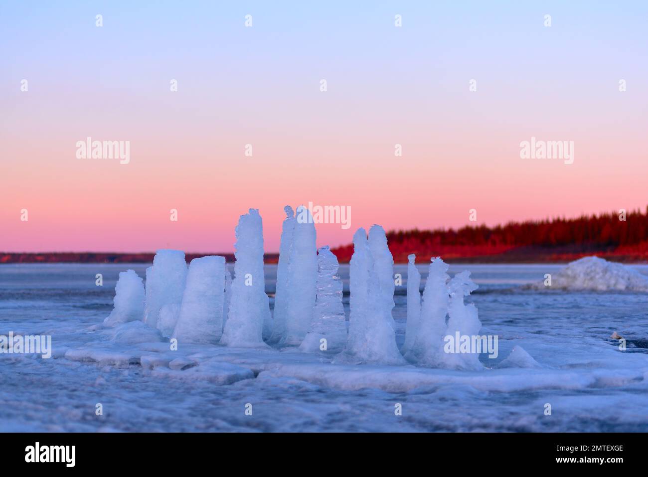 A panorama of thrown and melting cut ice with pillars for defrosting ...