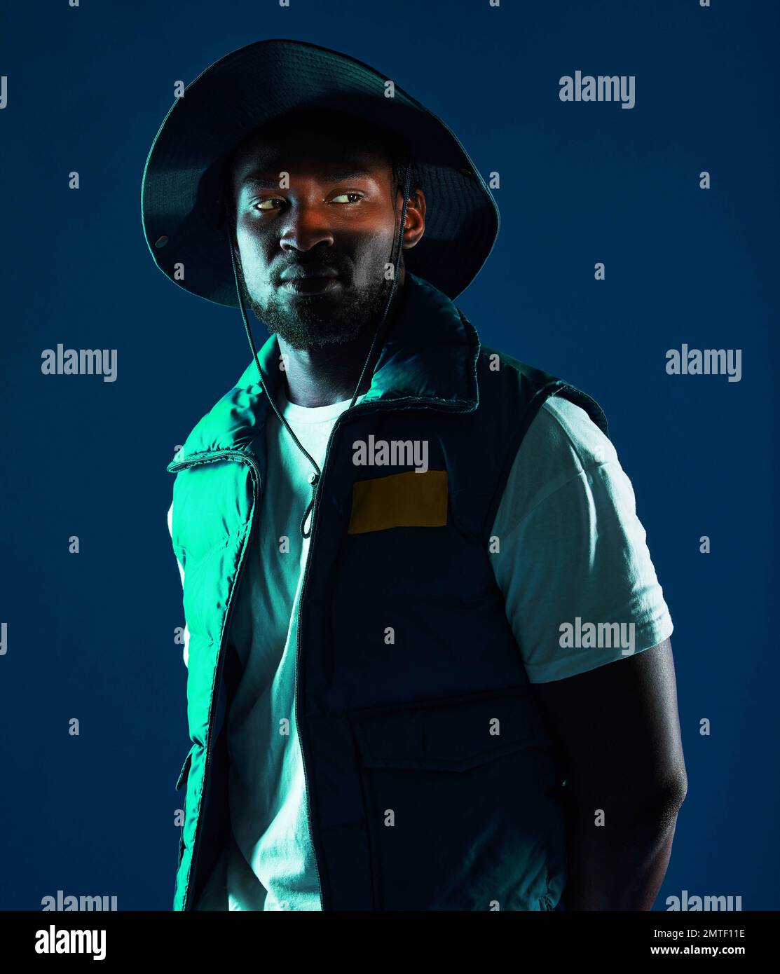 Fashion, shadow and black man model in a studio with a cool, stylish ...