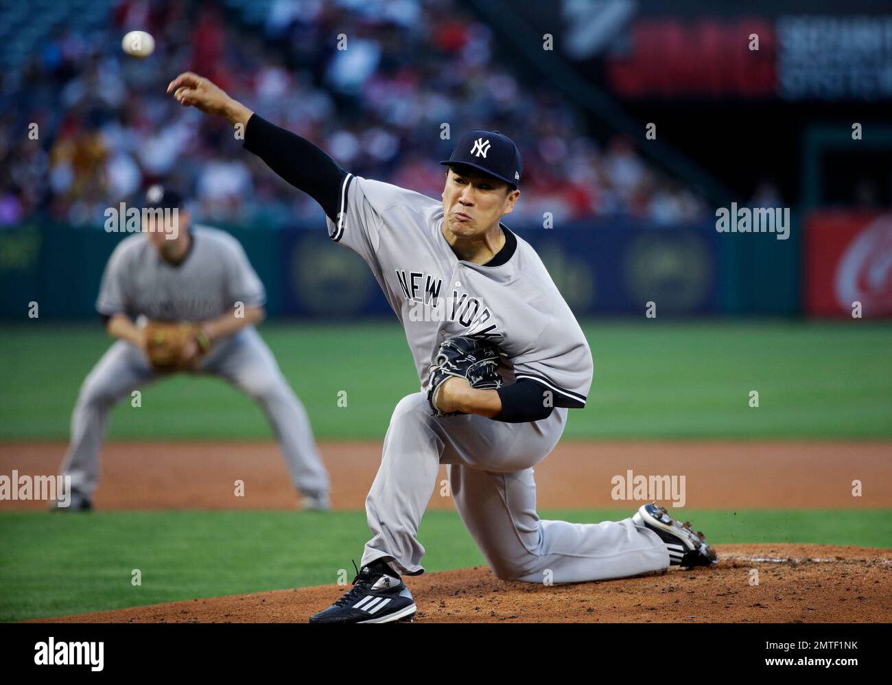 New York Yankees starting pitcher Masahiro Tanaka, of Japan, throws ...