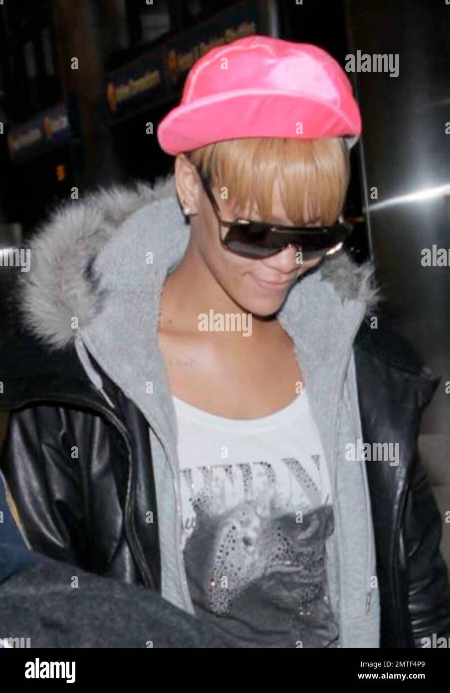 Rihanna arrives at LAX and walks to a waiting limo wearing a trendy ...