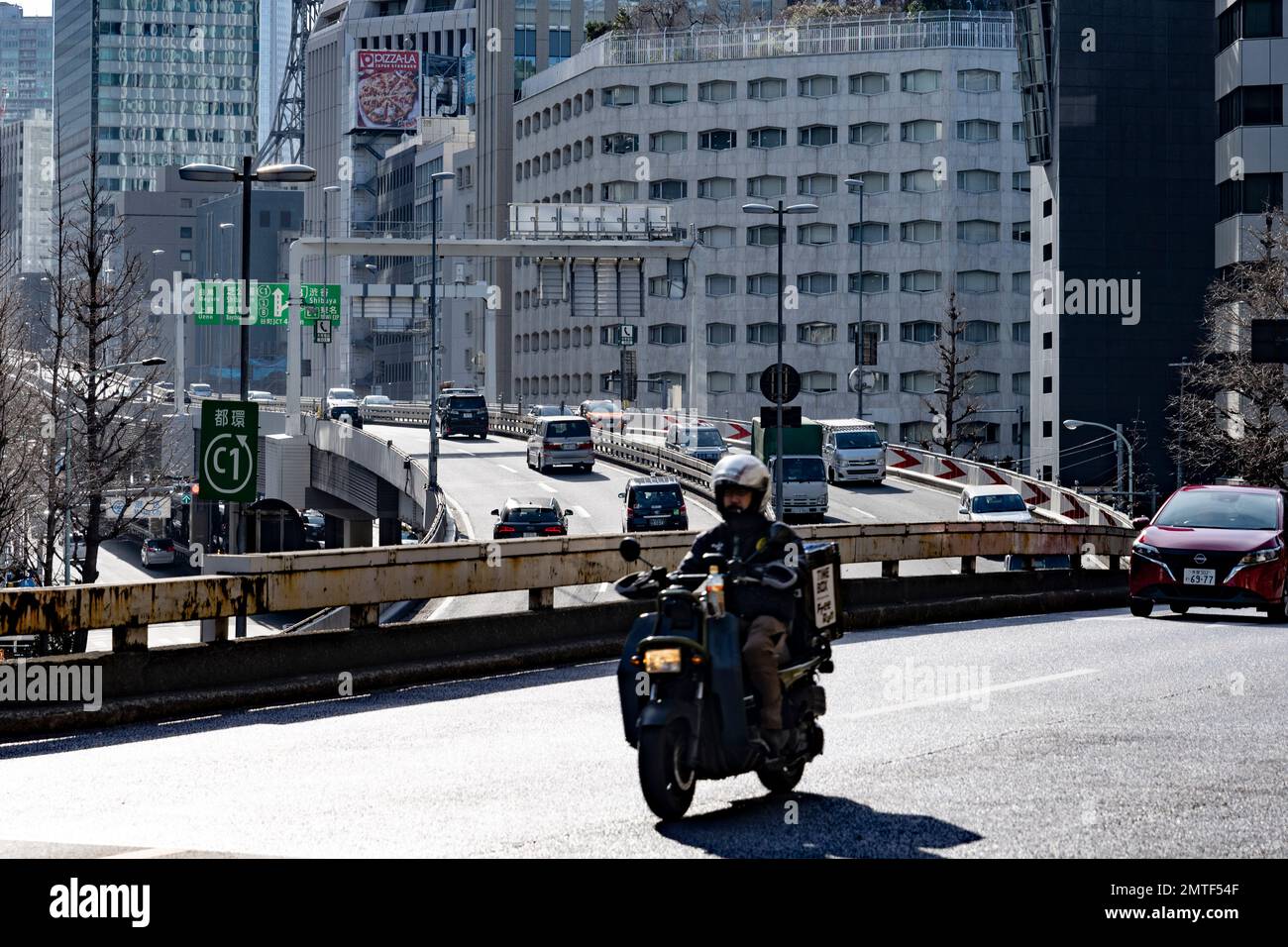 Tokyo, Japan. 1st Feb, 2023. Motor vehicle traffic passing through ...