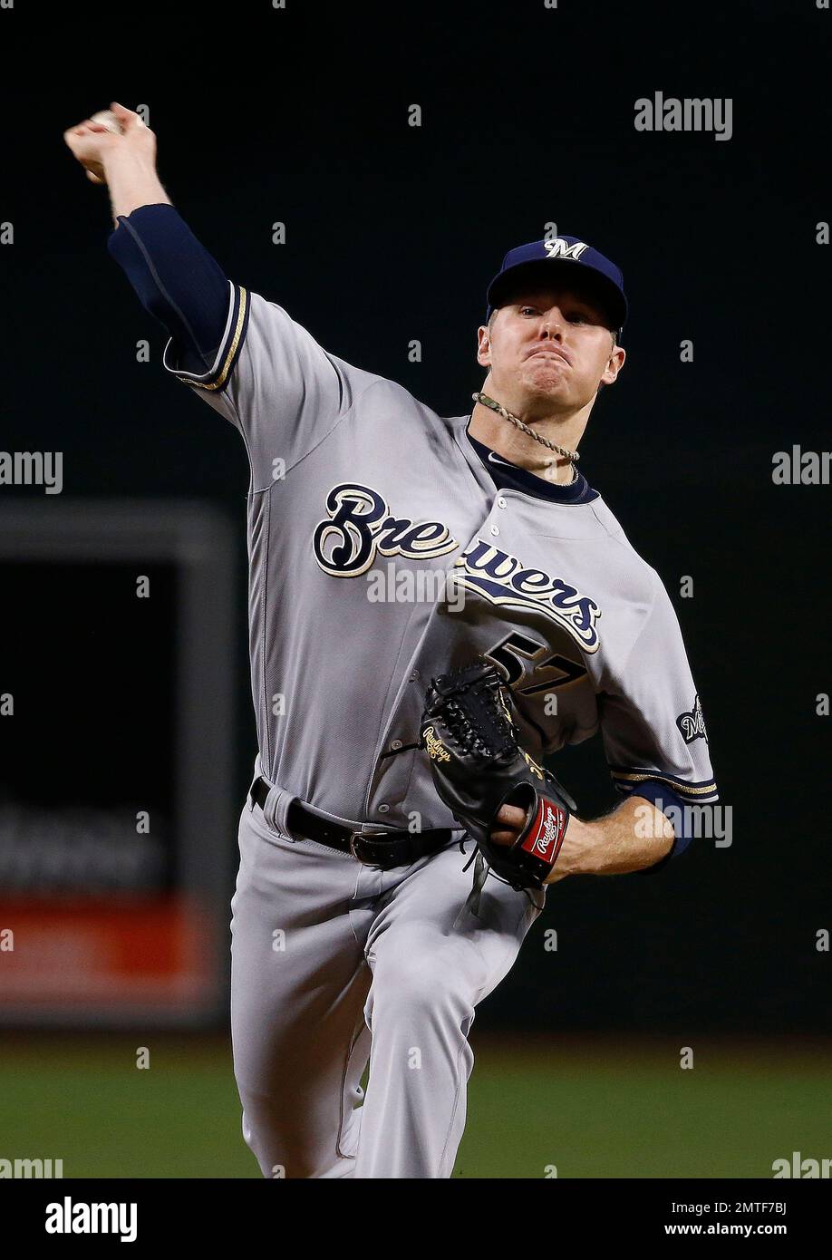 Milwaukee Brewers' Chase Anderson throws a pitch against the Arizona ...