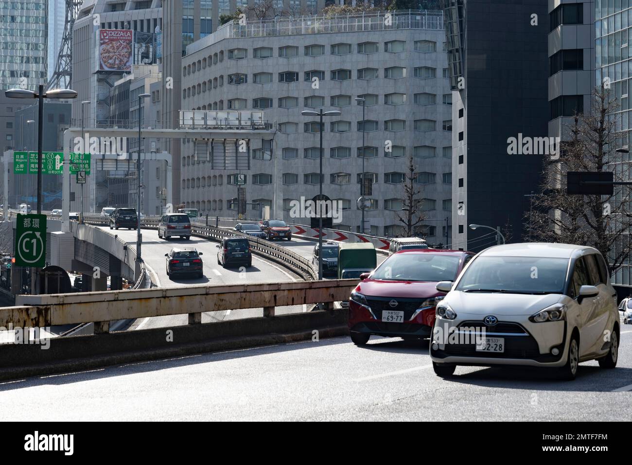Tokyo, Japan. 1st Feb, 2023. Motor vehicle traffic passing through ...