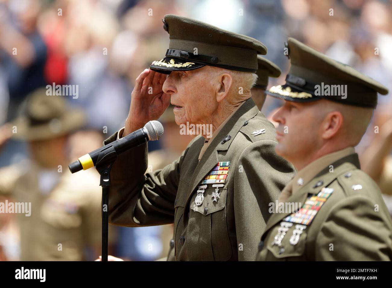 One hundred-year-old retired Marine Col. James "Rip" Harper sings the ...