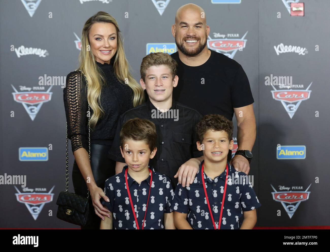 Tito Ortiz, right, Kristin Ortiz, left, and their children arrive at ...
