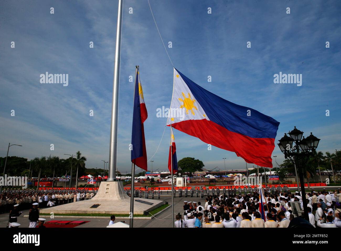 The Philippine flag is raised to celebrate the 119th anniversary of ...