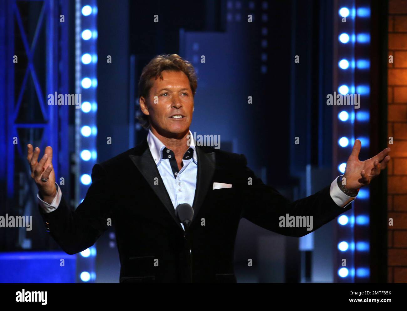 Former New York Ranger Ron Duguay introduces a performance by the cast ...