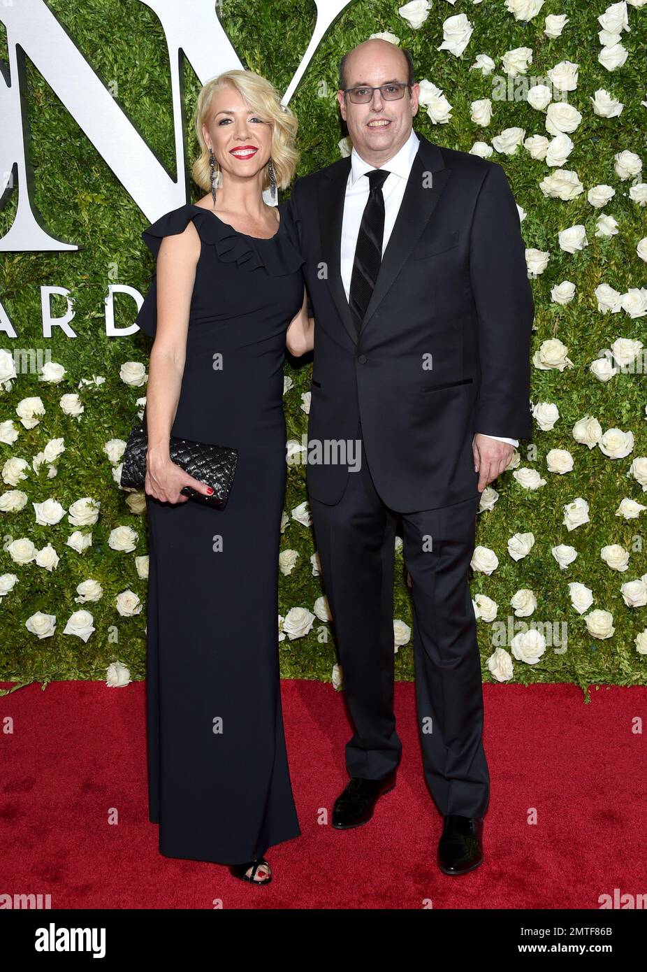 Kelly Devine, left, and Christopher Ashley arrive at the 71st annual ...