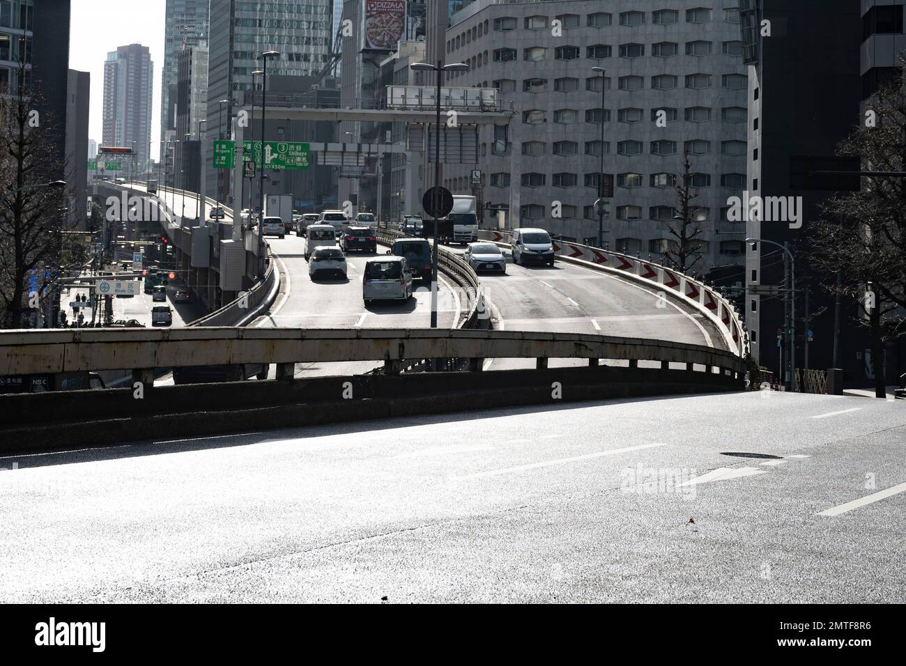 Tokyo, Japan. 1st Feb, 2023. Motor vehicle traffic passing through ...