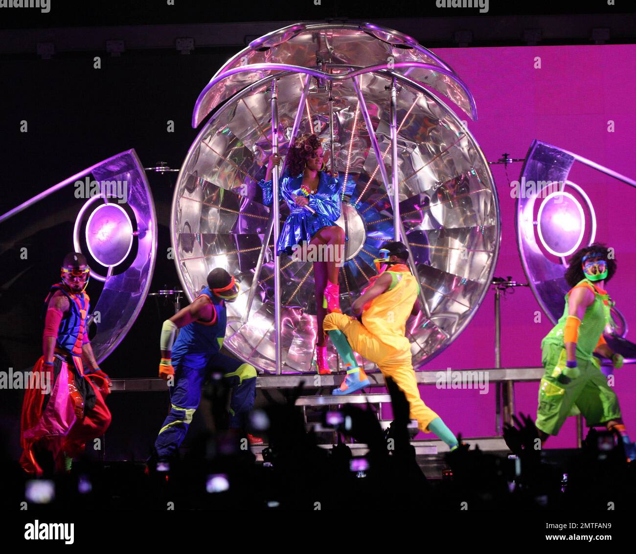 Rihanna wears a revealing, Caribbean-inspired outfit as she performs ...