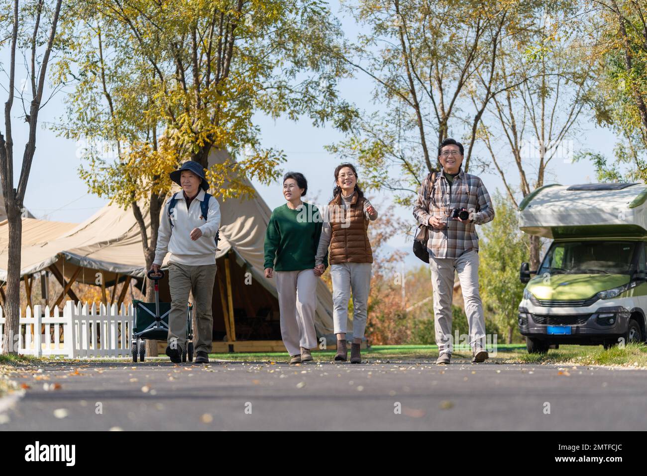 A group of the elderly in the rv camping holiday Stock Photo - Alamy
