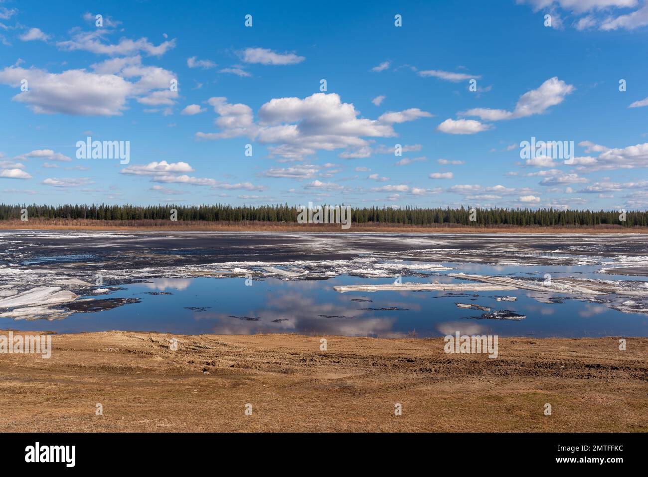 Ice drift on the spring northern river in Yakutia Vilyui against the ...