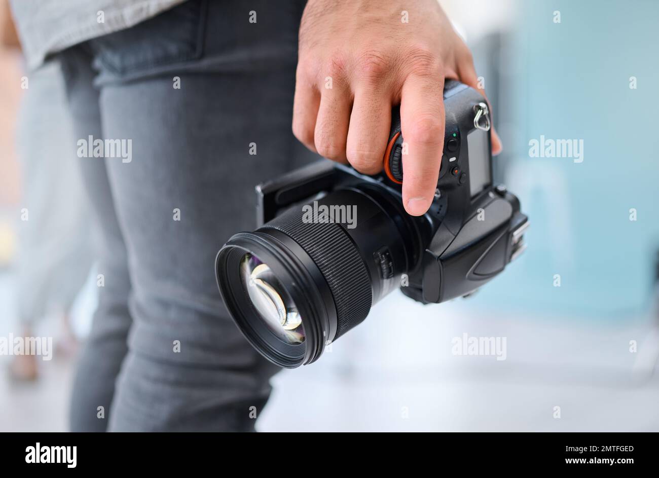 Digital photography, camera and hands of photographer in studio ...