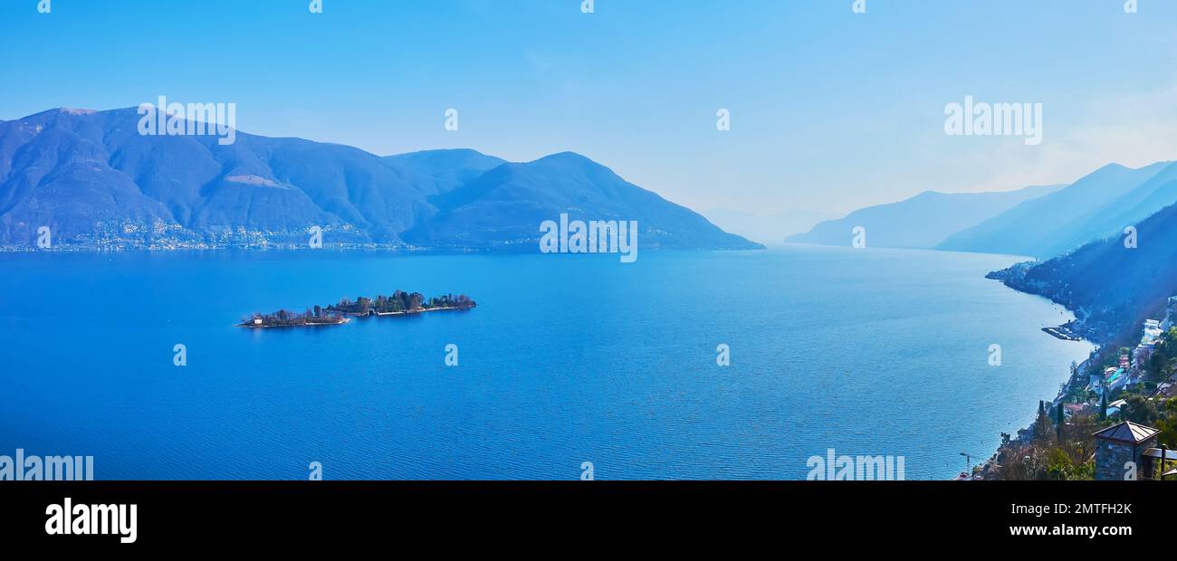 Panorama of bright blue surface of Lake Maggiore with tiny Brissago ...