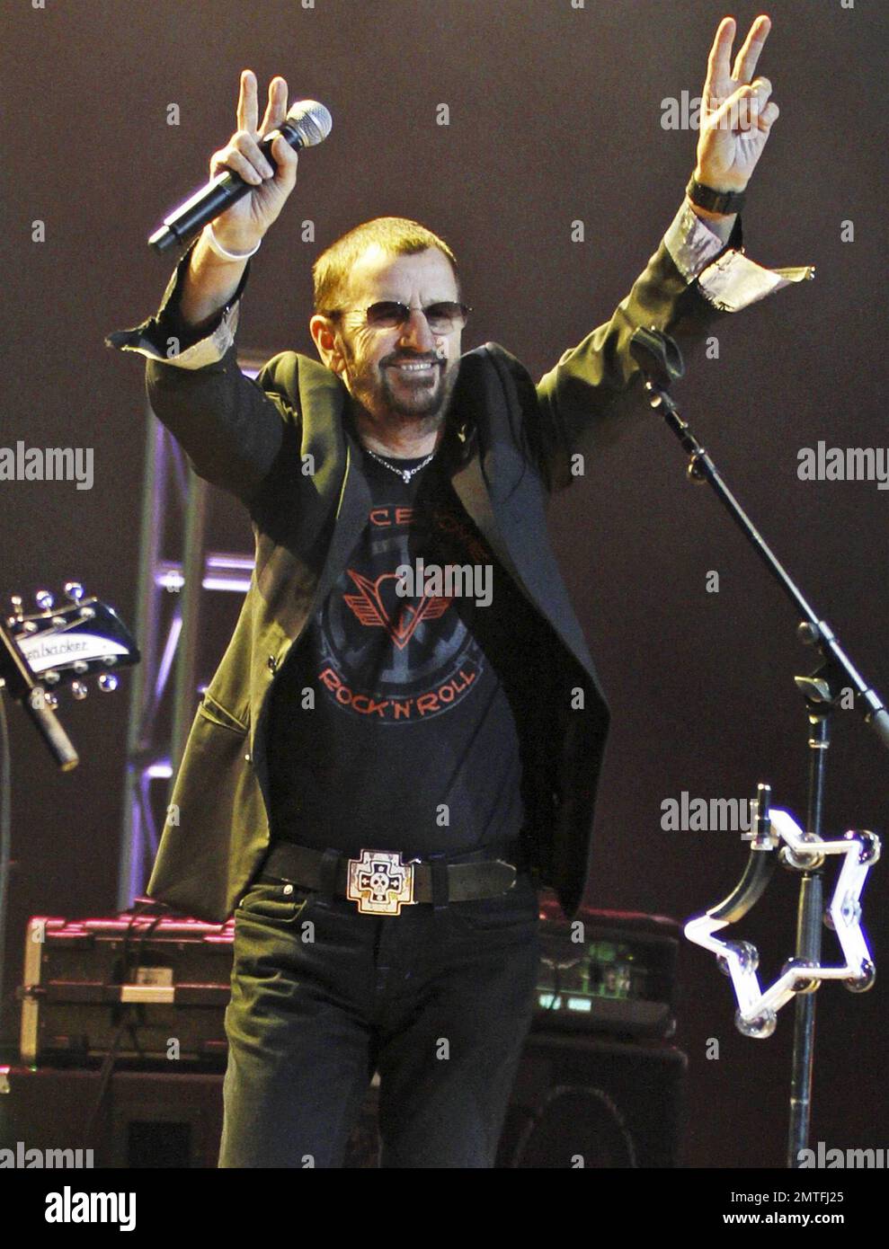 Former Beatle Ringo Starr (Richard Starkey) sings and plays the drums ...
