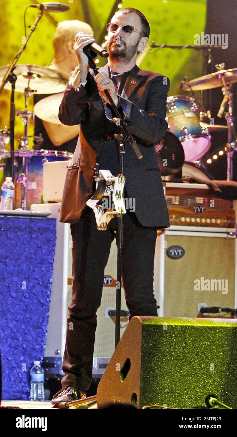 Former Beatle Ringo Starr (Richard Starkey) sings and plays the drums ...