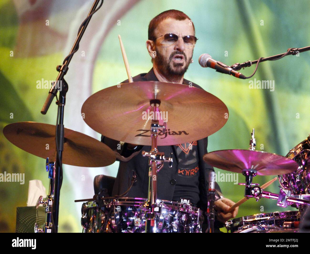 Former Beatle Ringo Starr (Richard Starkey) sings and plays the drums ...