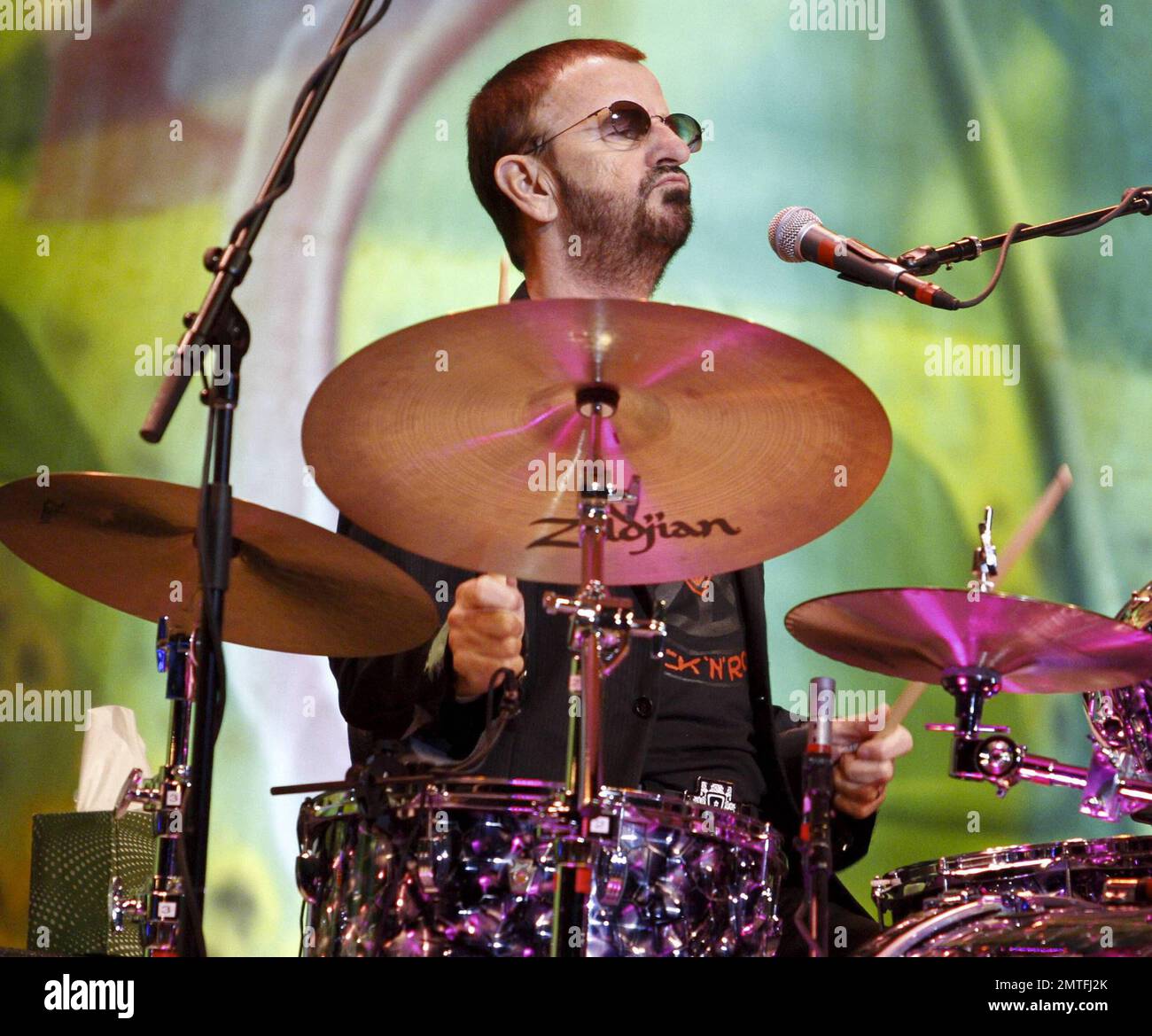 Former Beatle Ringo Starr (Richard Starkey) sings and plays the drums ...