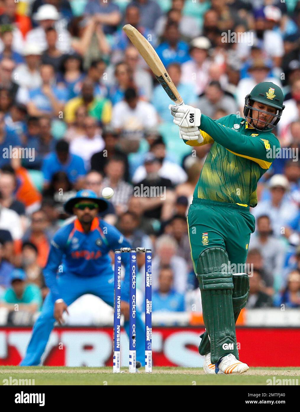 South Africa's Quinton de Kock plays a shot off the bowling of India's ...