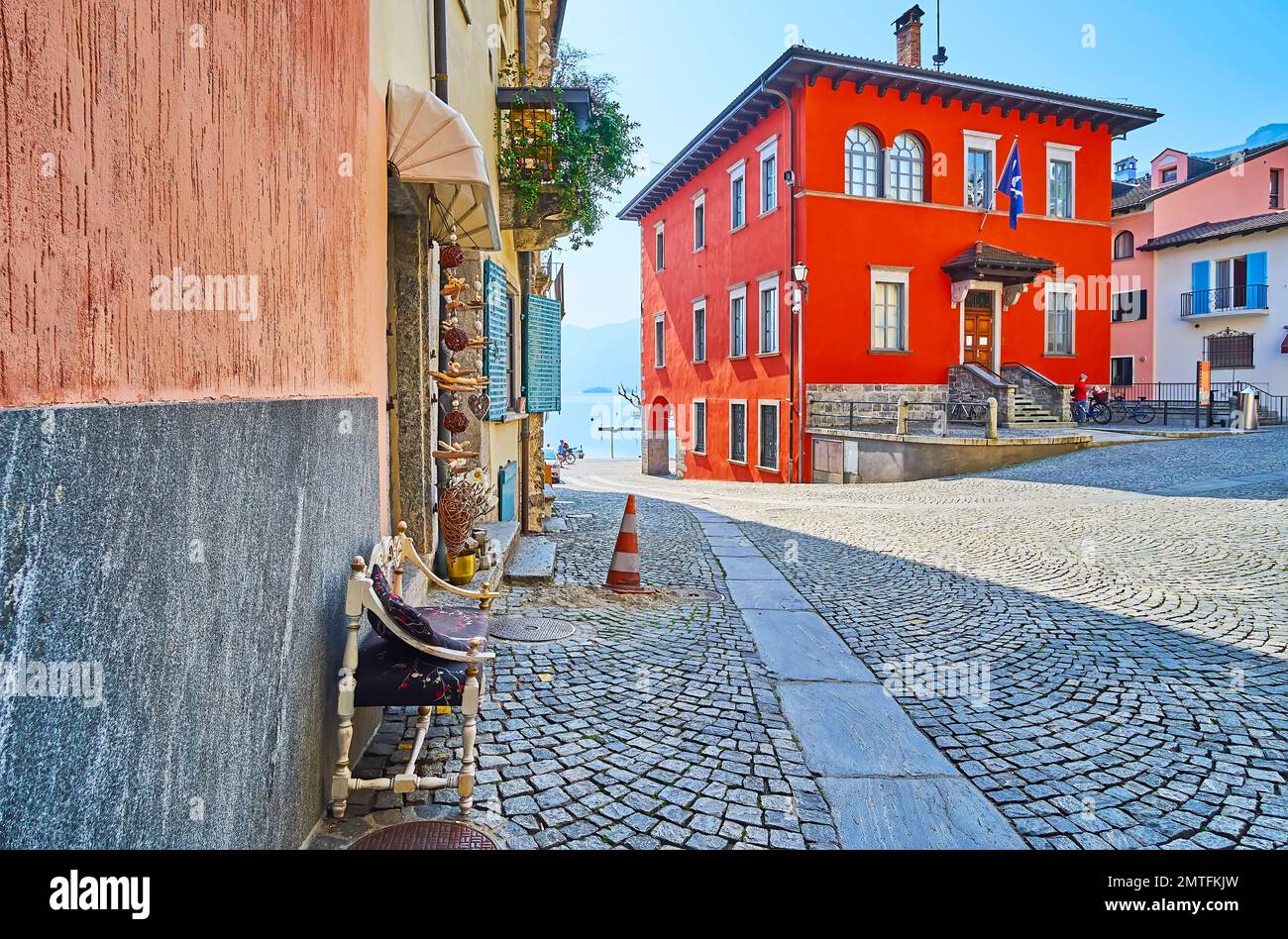 Historic houses and red house of Town Hall of Ascona from Piazza San ...
