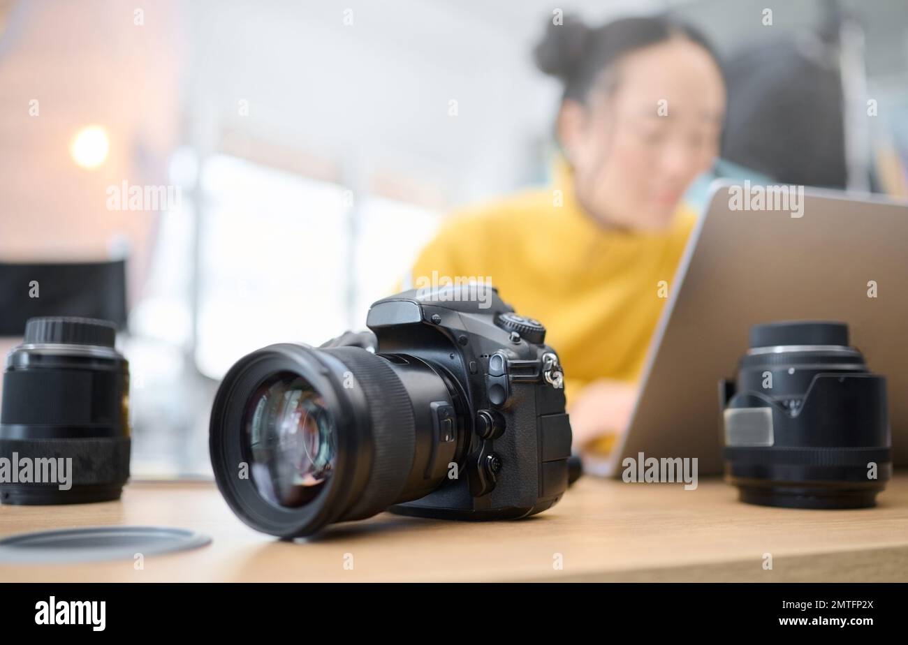 Photography camera, laptop and photographer editing photoshoot, focus ...
