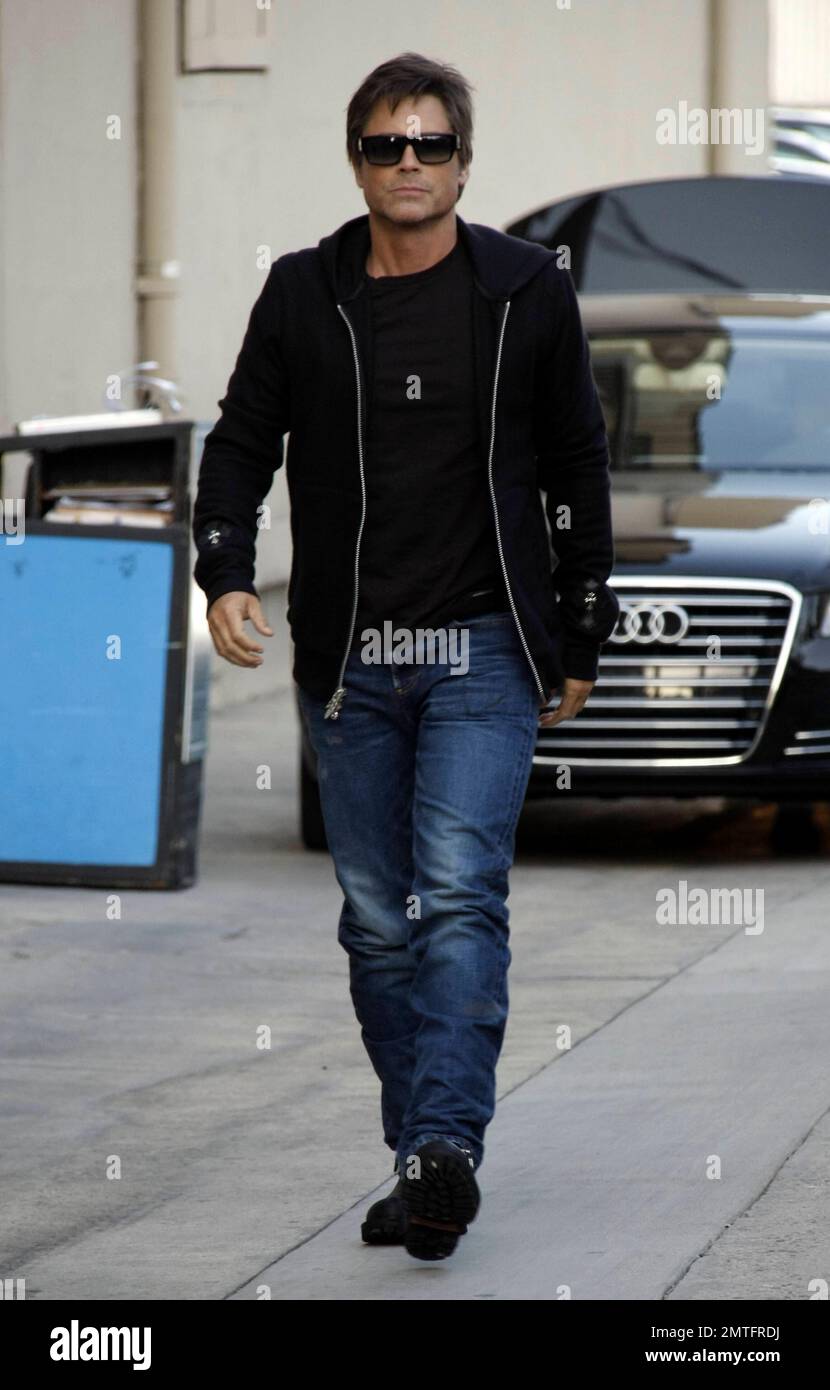 Rob Lowe signs autographs as he arrives at the "Jimmy Kimmel Live ...
