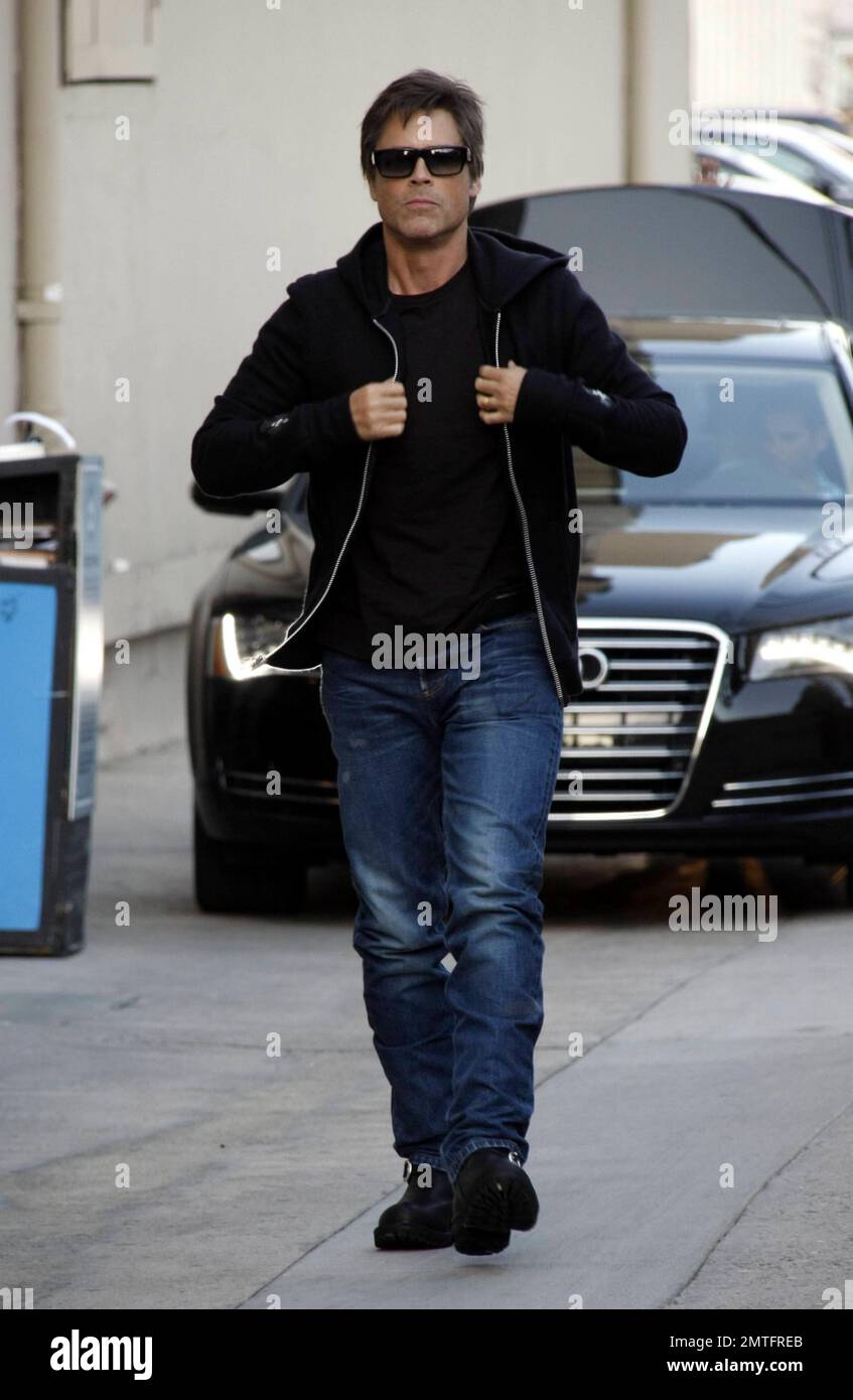 Rob Lowe signs autographs as he arrives at the "Jimmy Kimmel Live ...