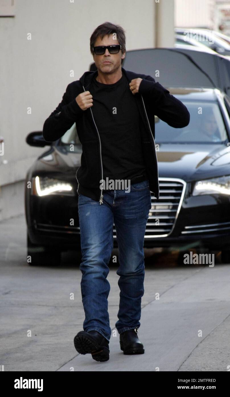 Rob Lowe signs autographs as he arrives at the "Jimmy Kimmel Live ...