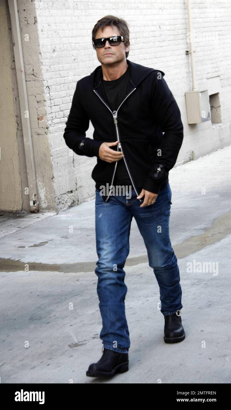 Rob Lowe signs autographs as he arrives at the "Jimmy Kimmel Live ...