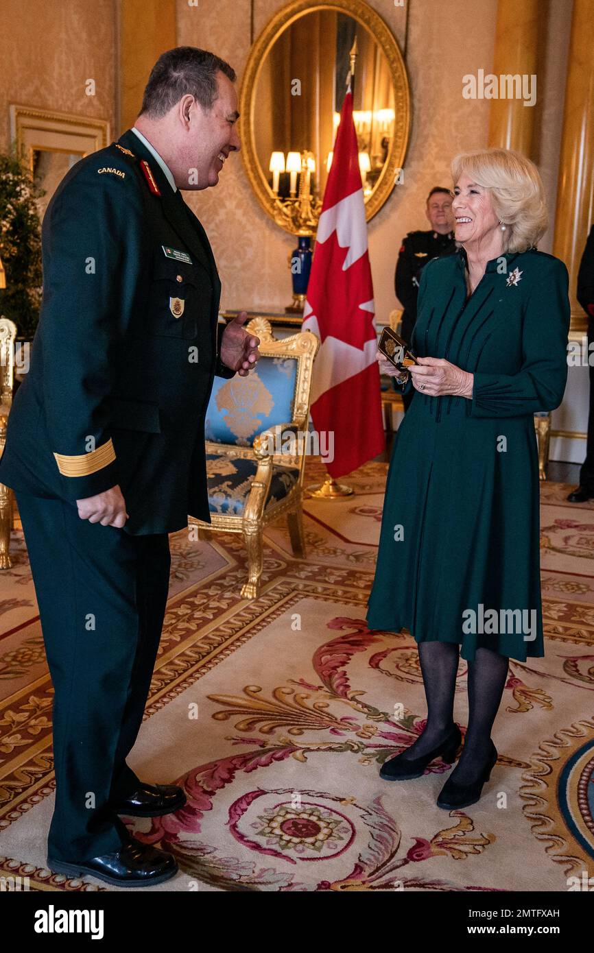 The Queen Consort is presented with the Canadian Forces' Decoration by ...