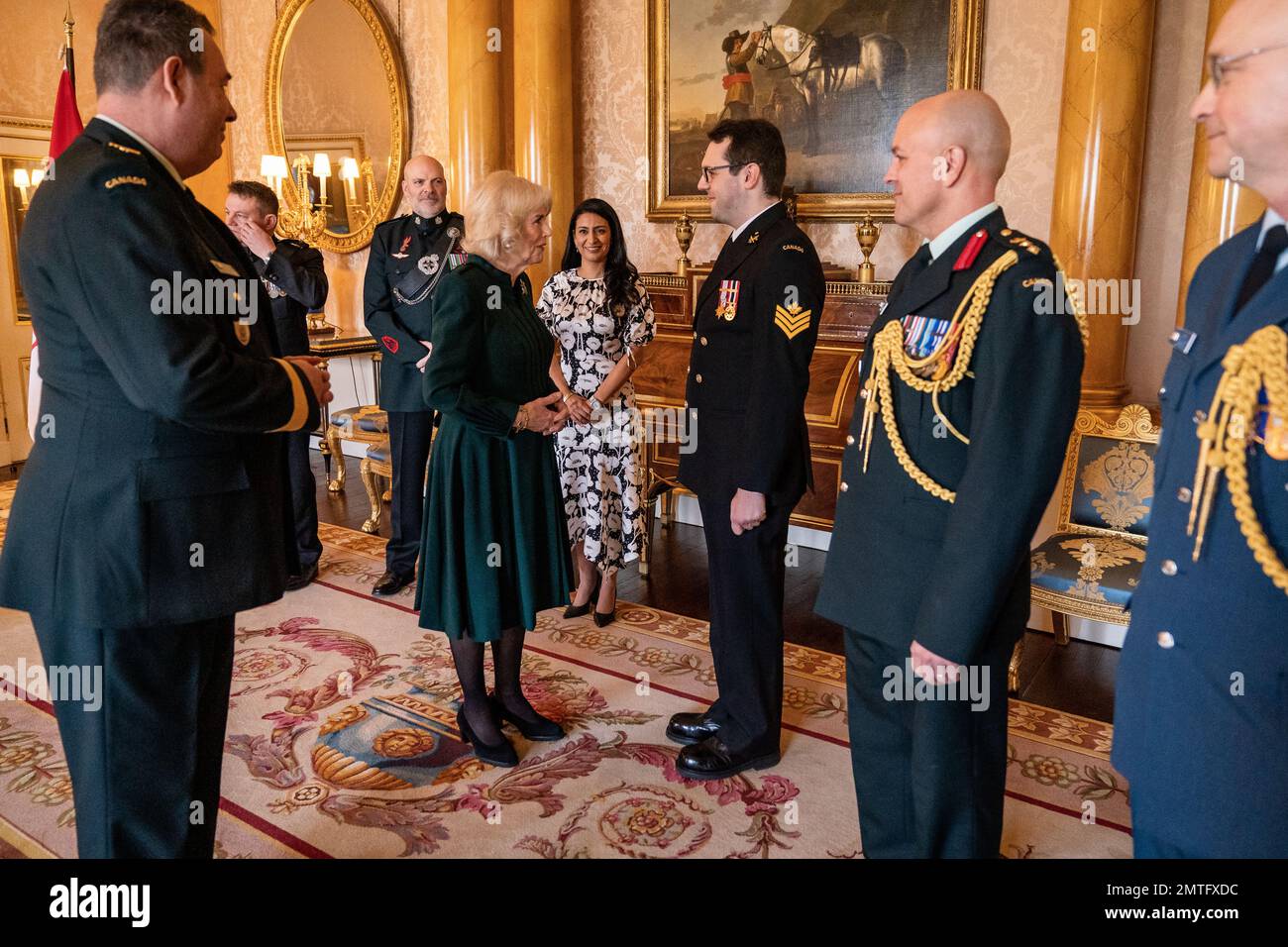 The Queen Consort meets with guests from the Canadian Military after ...
