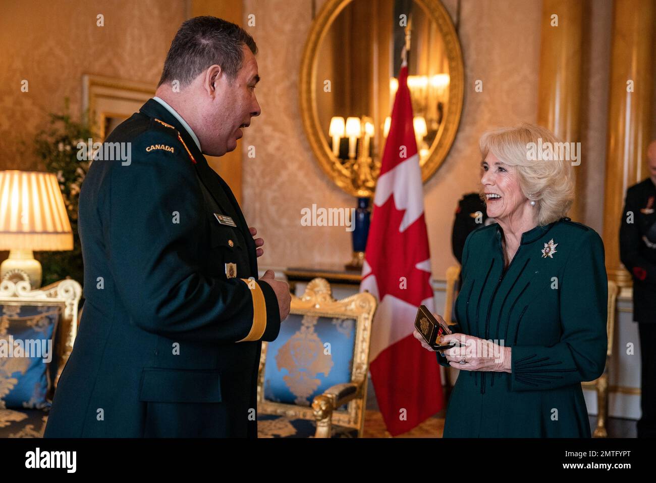 The Queen Consort is presented with the Canadian Forces' Decoration by ...