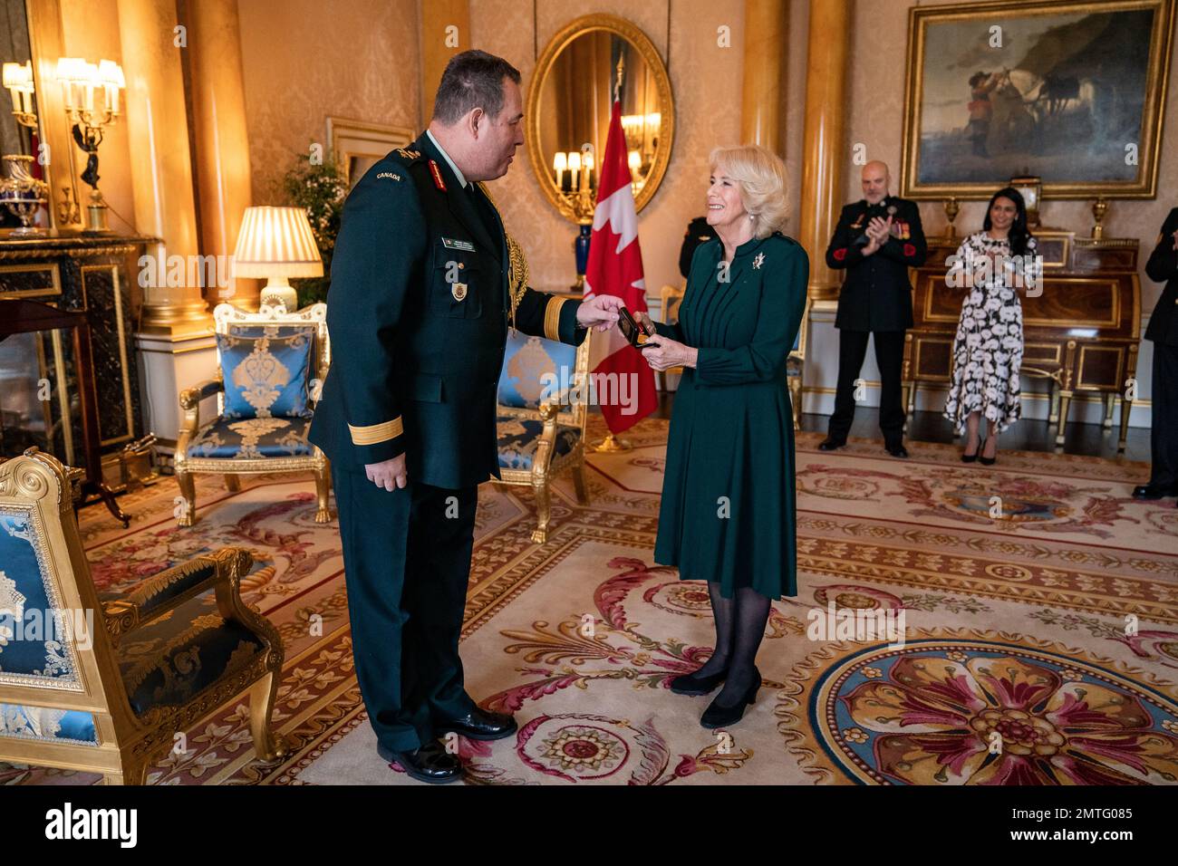 The Queen Consort is presented with the Canadian Forces' Decoration by ...