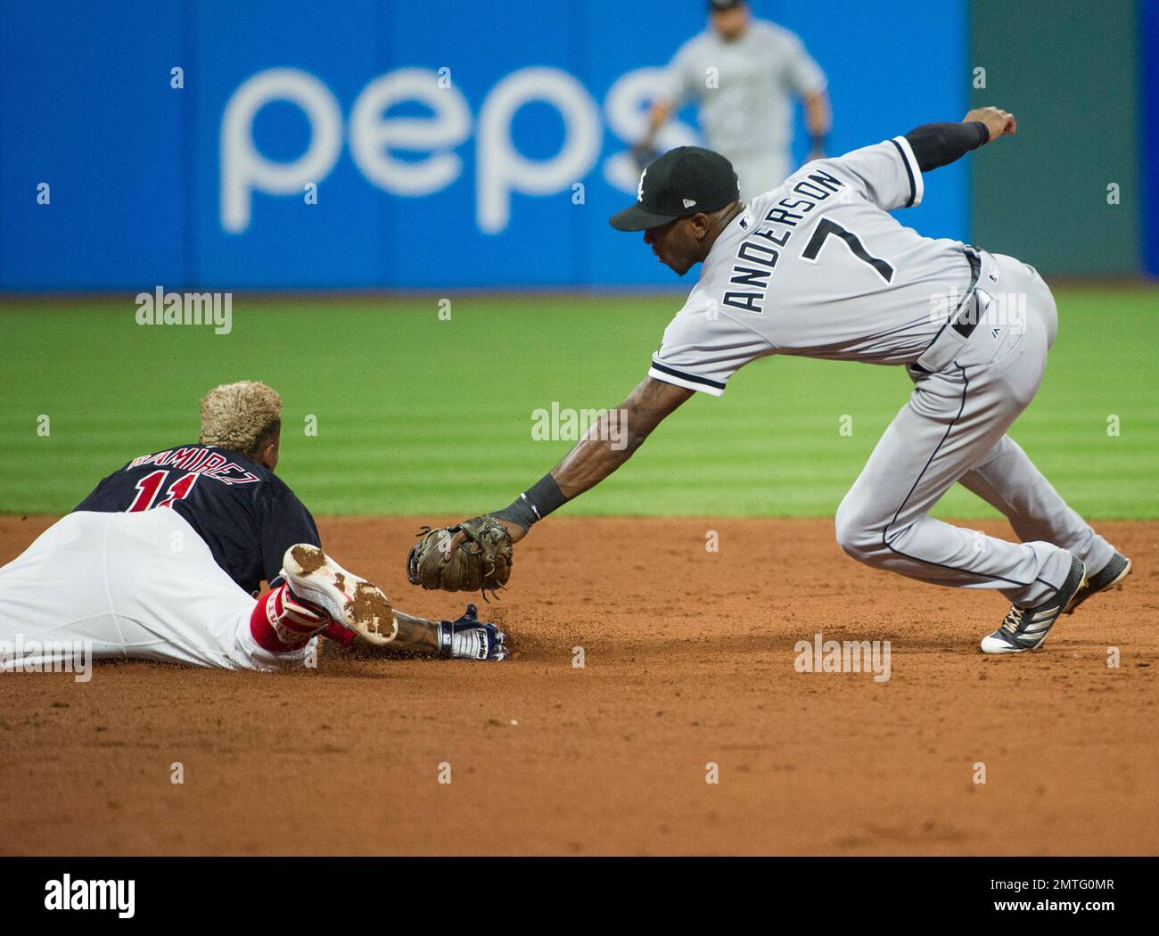 Cleveland Indians' Jose Ramirez (11) is safe at second with a double ...