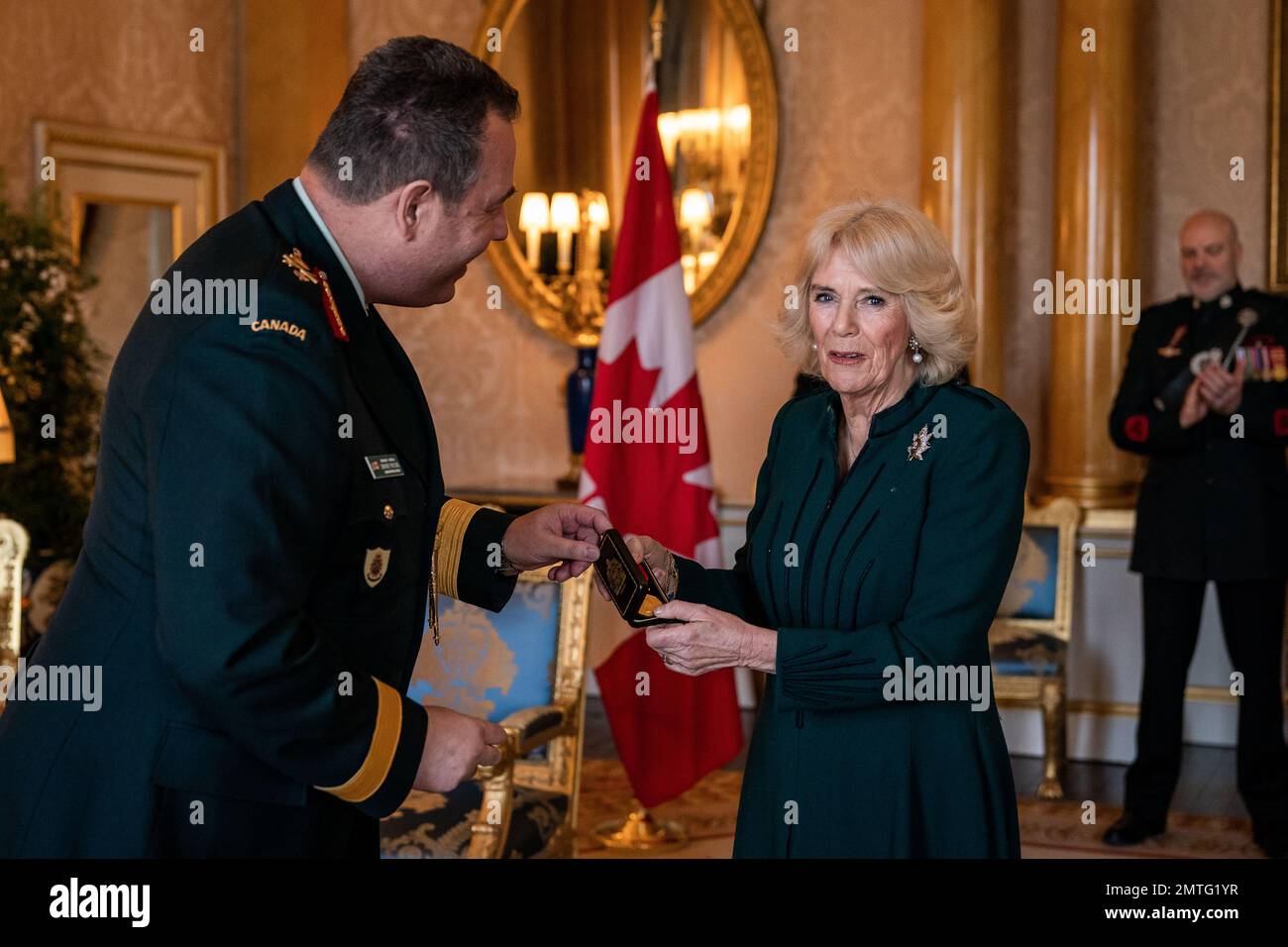The Queen Consort is presented with the Canadian Forces' Decoration by ...