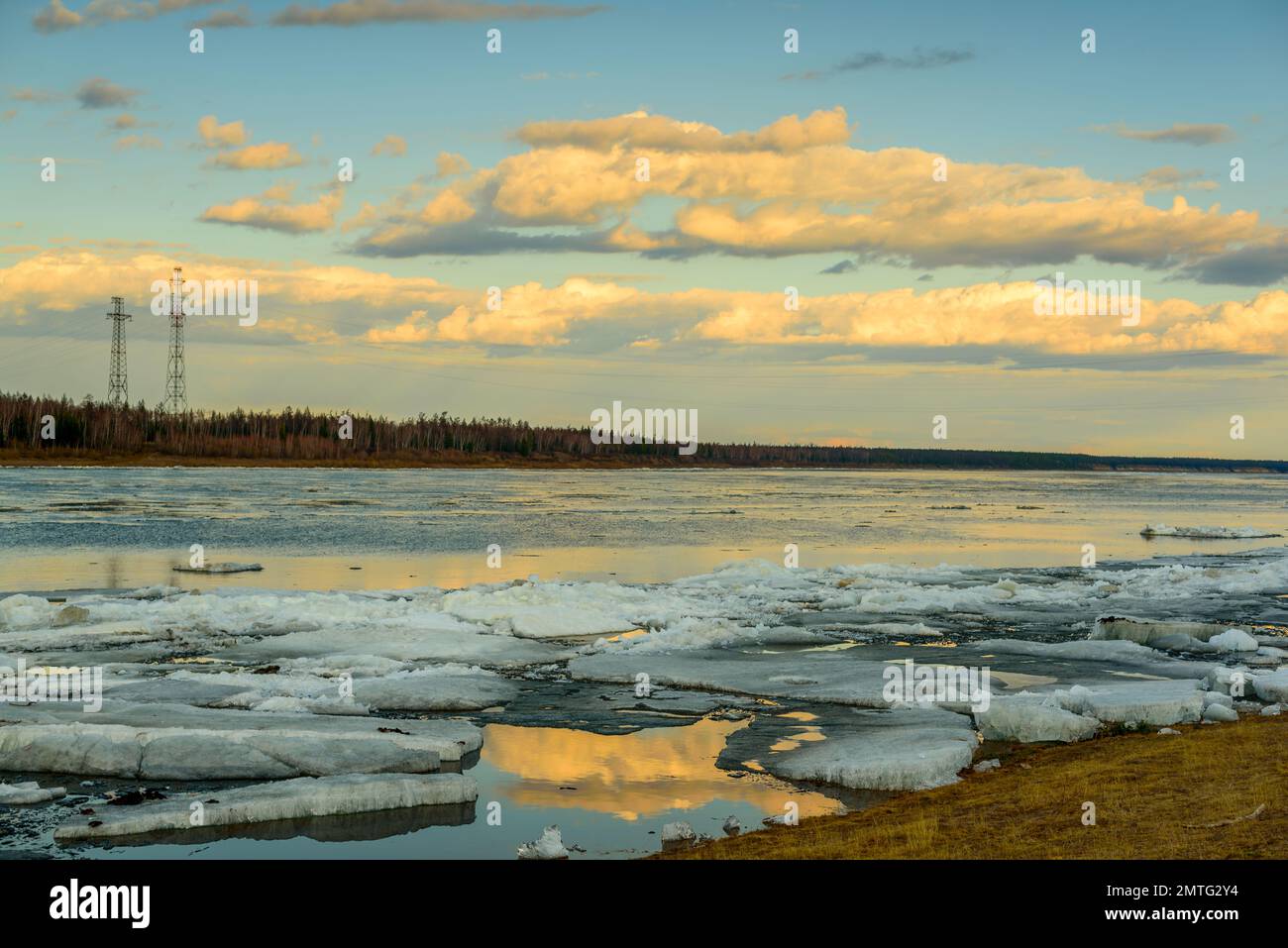 The remains of the last spring ice on a river in Yakutia are melting ...