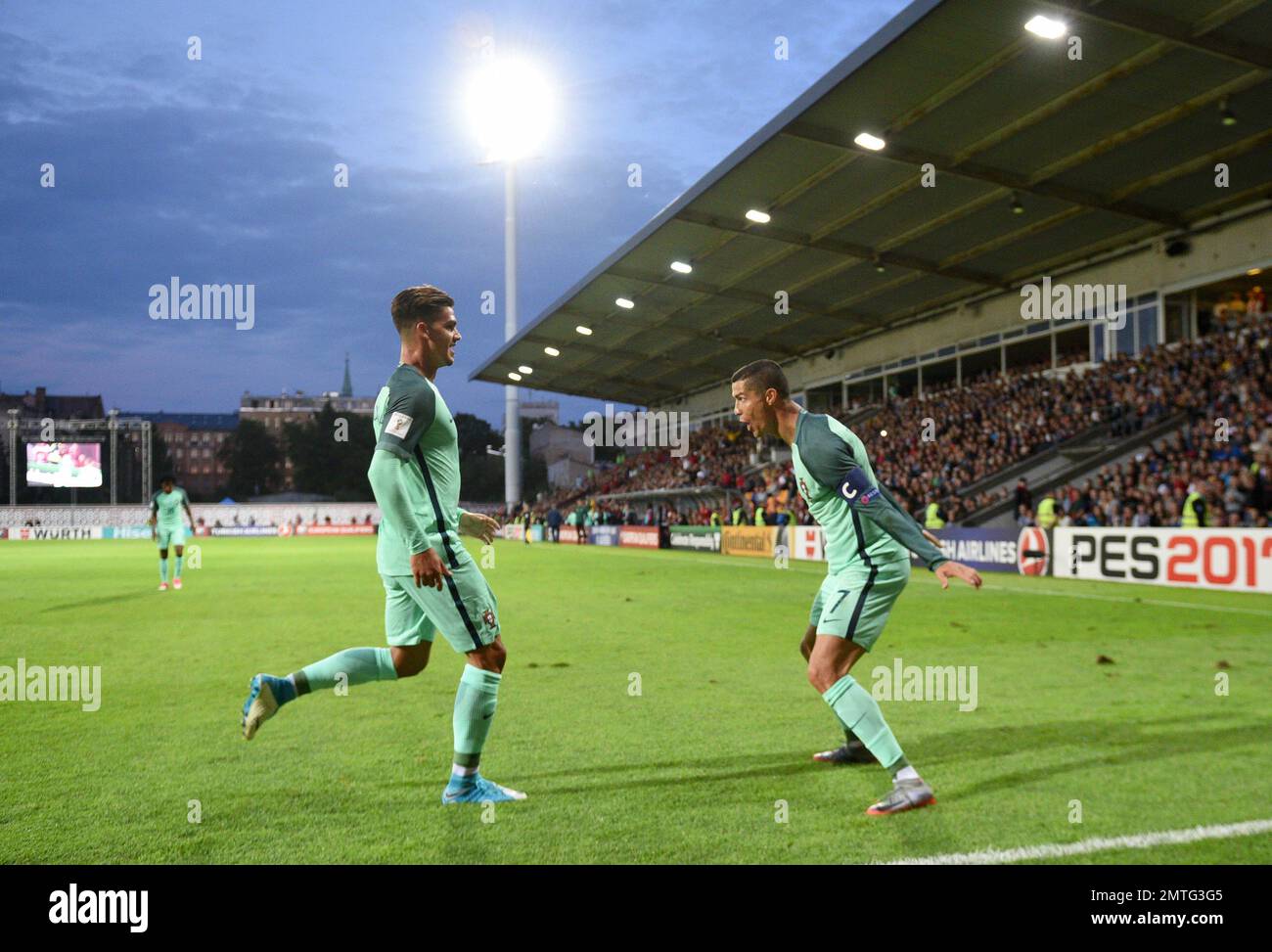 Portugal's Cristiano Ronaldo, right, reacts with Andre Silva, left ...