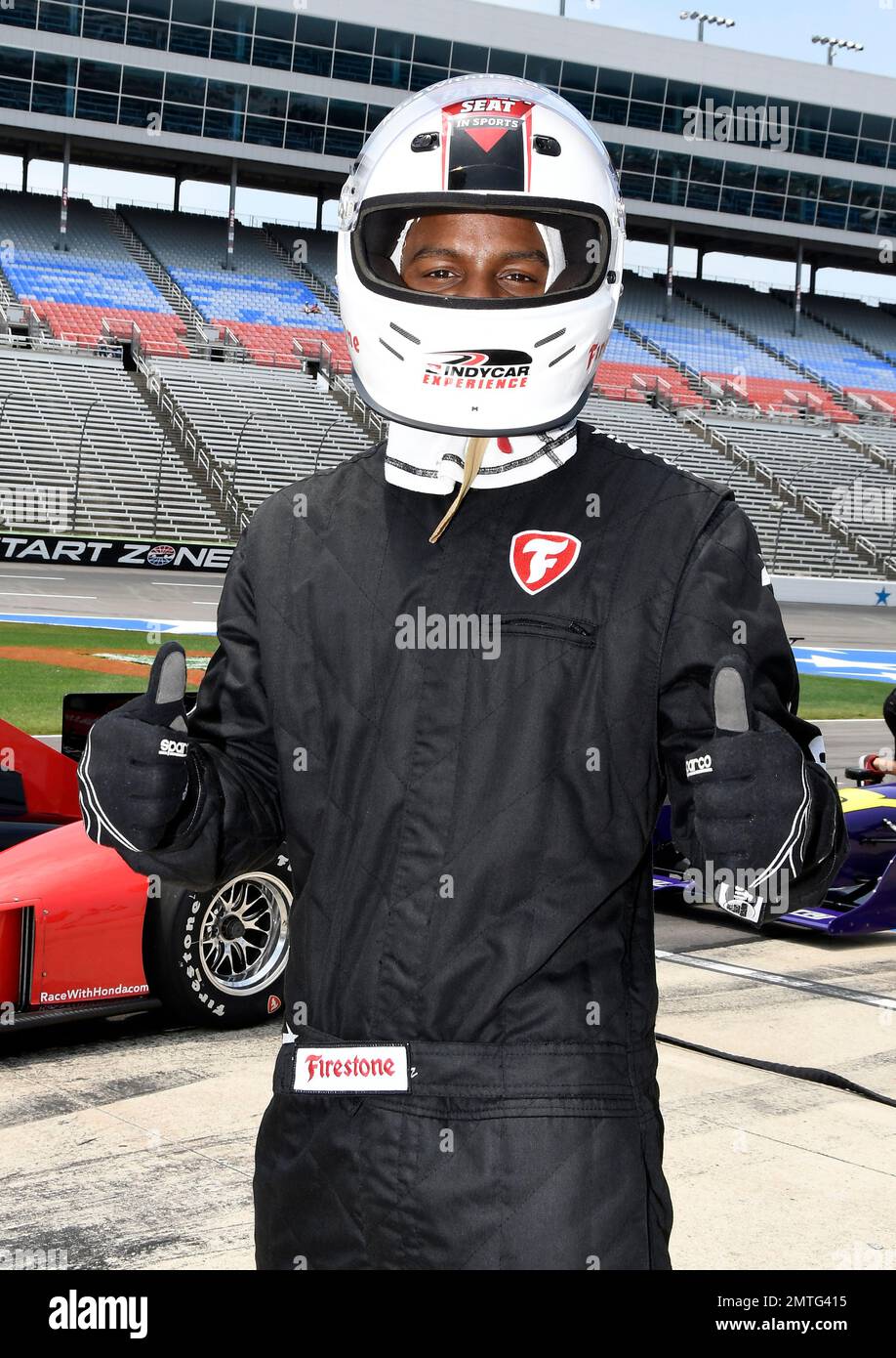 Dallas Mavericks' Yogi Ferrell gives a thumbs up as he poses for photos ...