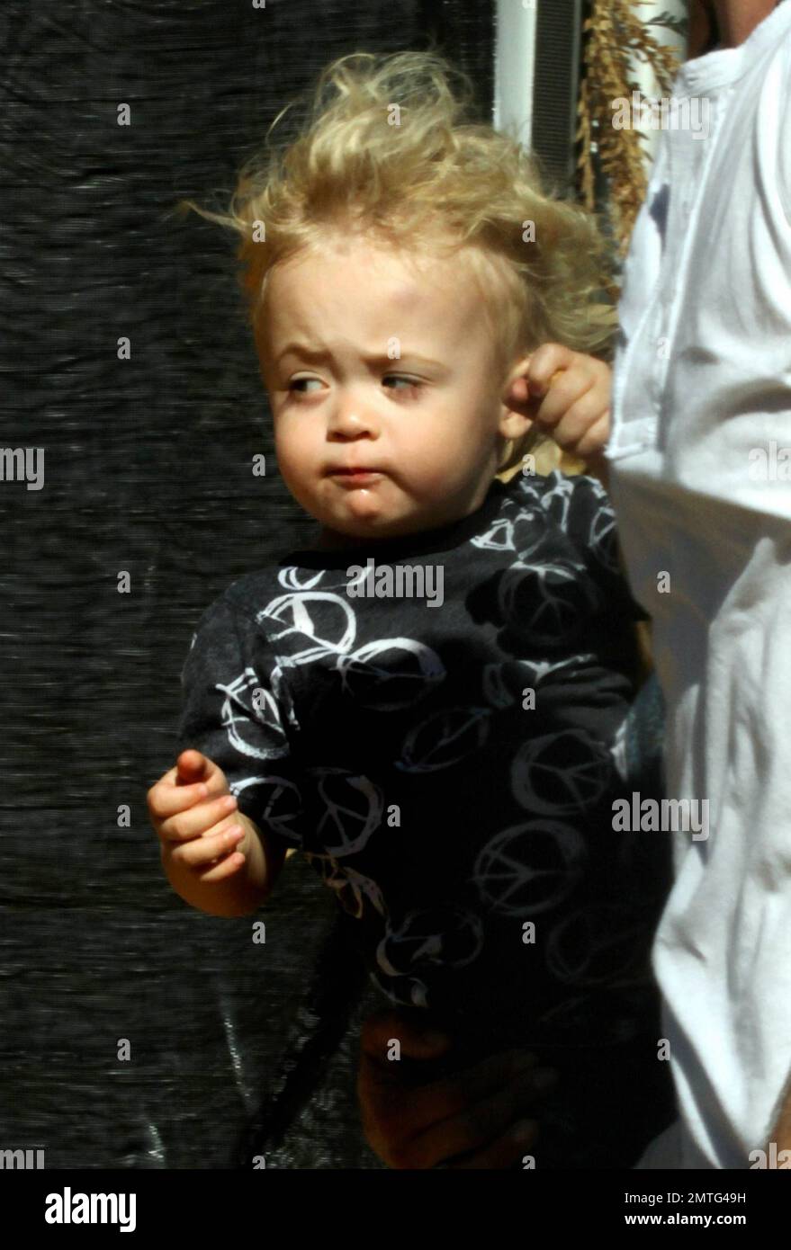 Grammy Award-winning R&B singer Robin Thicke along with his actress ...