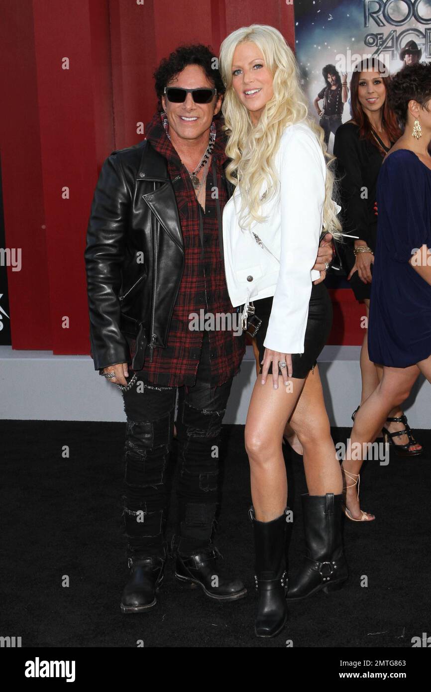 Neal Schon and Michaele Salahi at the Rock of Ages premiere at the ...