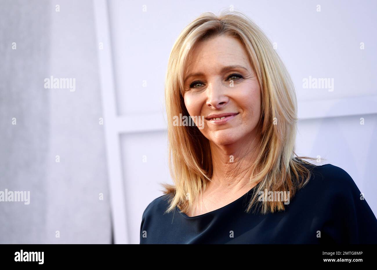 Actress Lisa Kudrow poses at the 45th AFI Life Achievement Award ...