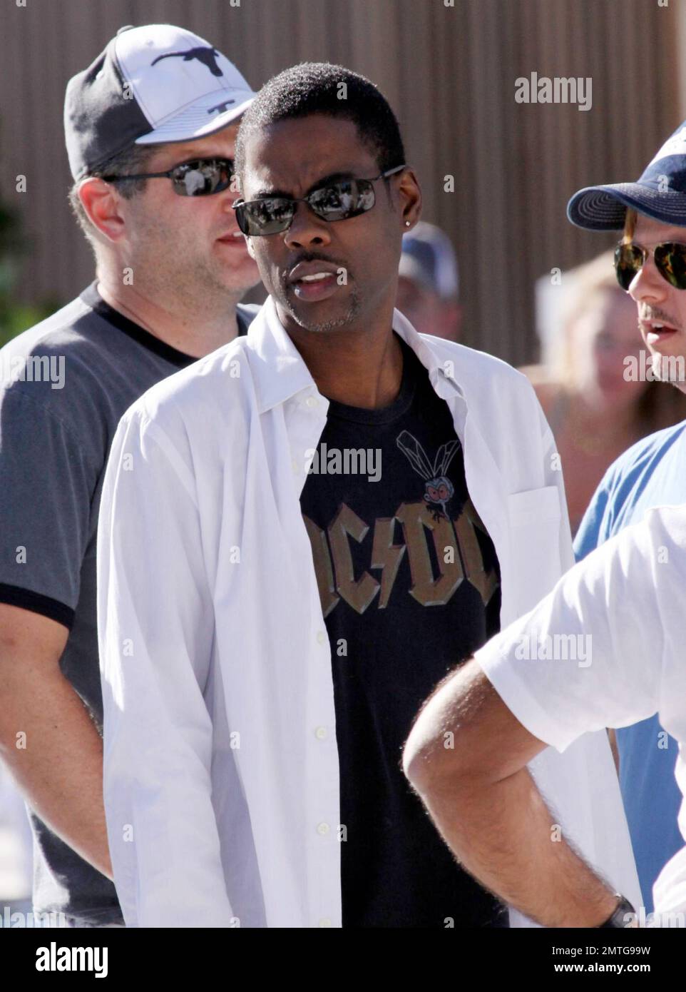 "Grown Ups" stars Chris Rock and David Spade hang out poolside at their ...
