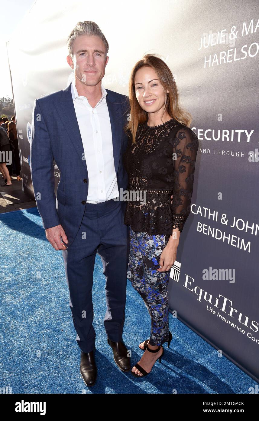 Chase Utley, left, and Jennifer Utley arrive at the Los Angeles Dodgers ...