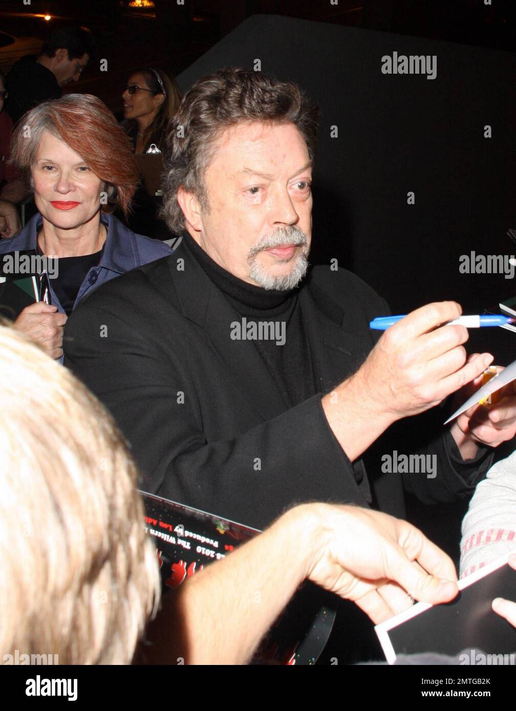 The original Frankenfurter, actor Tim Curry signs autographs outside ...