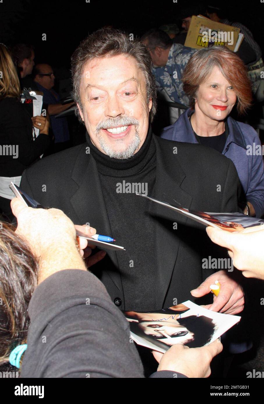 The original Frankenfurter, actor Tim Curry signs autographs outside ...