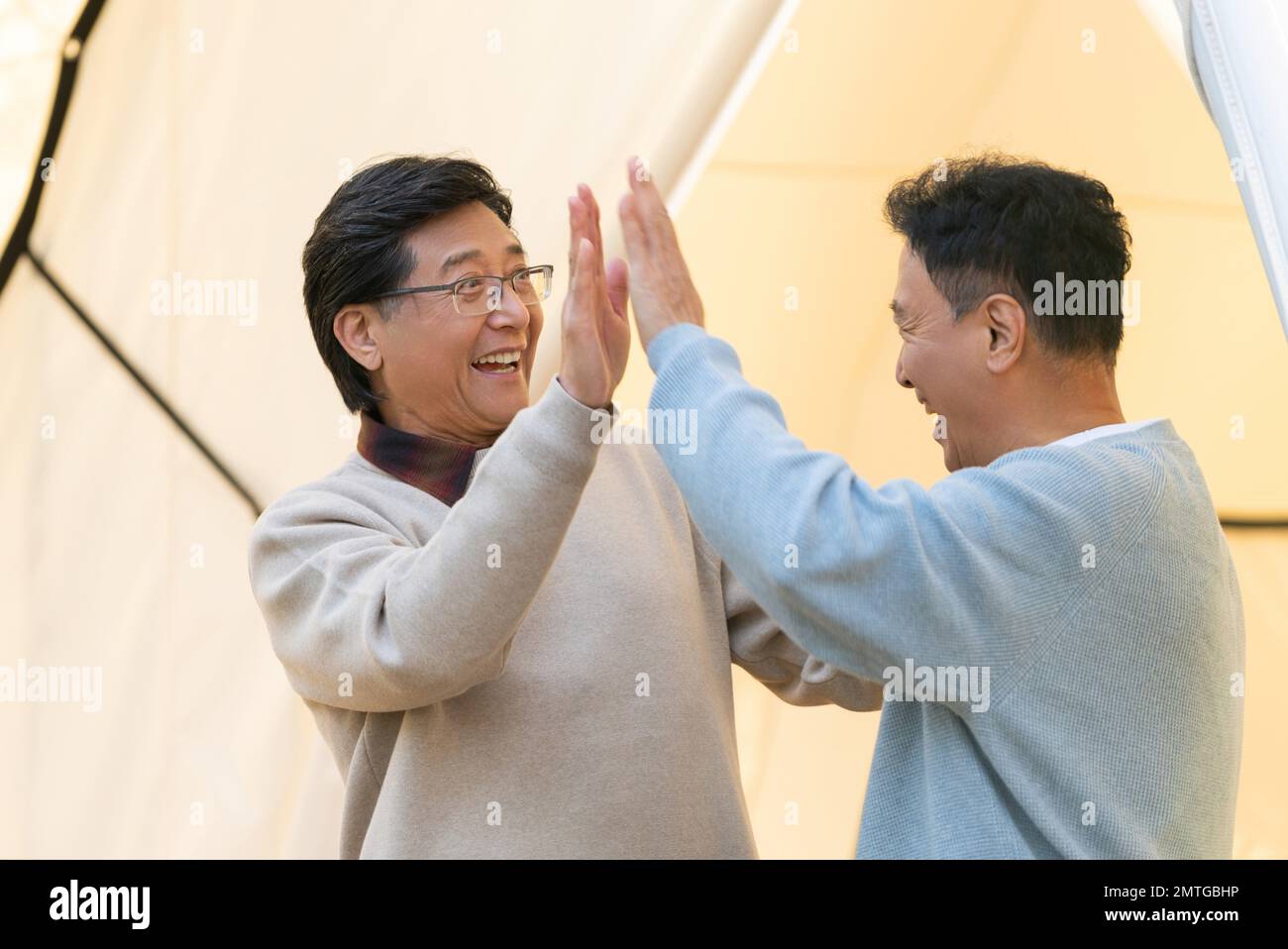 Two old men cheering hi-res stock photography and images - Alamy